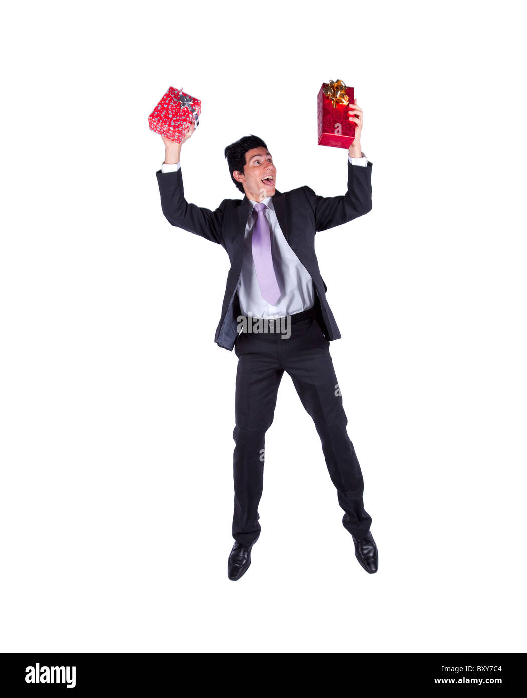 happy businessman jumping with some gift present isolated on white ...