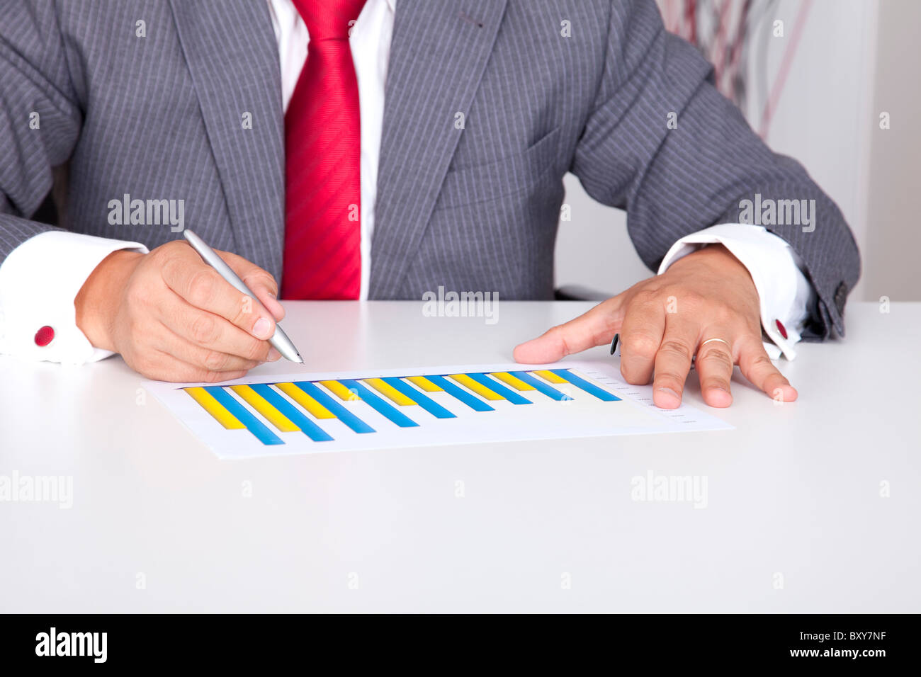 Analyzing the business progress in a bar chart (selective focus Stock ...