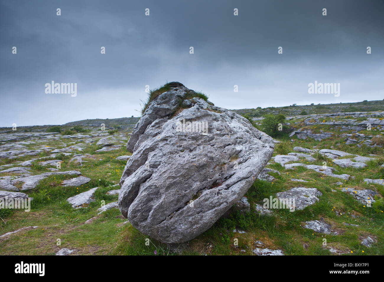Ancient prehistoric stone boulder and bare limestone pavement, The ...