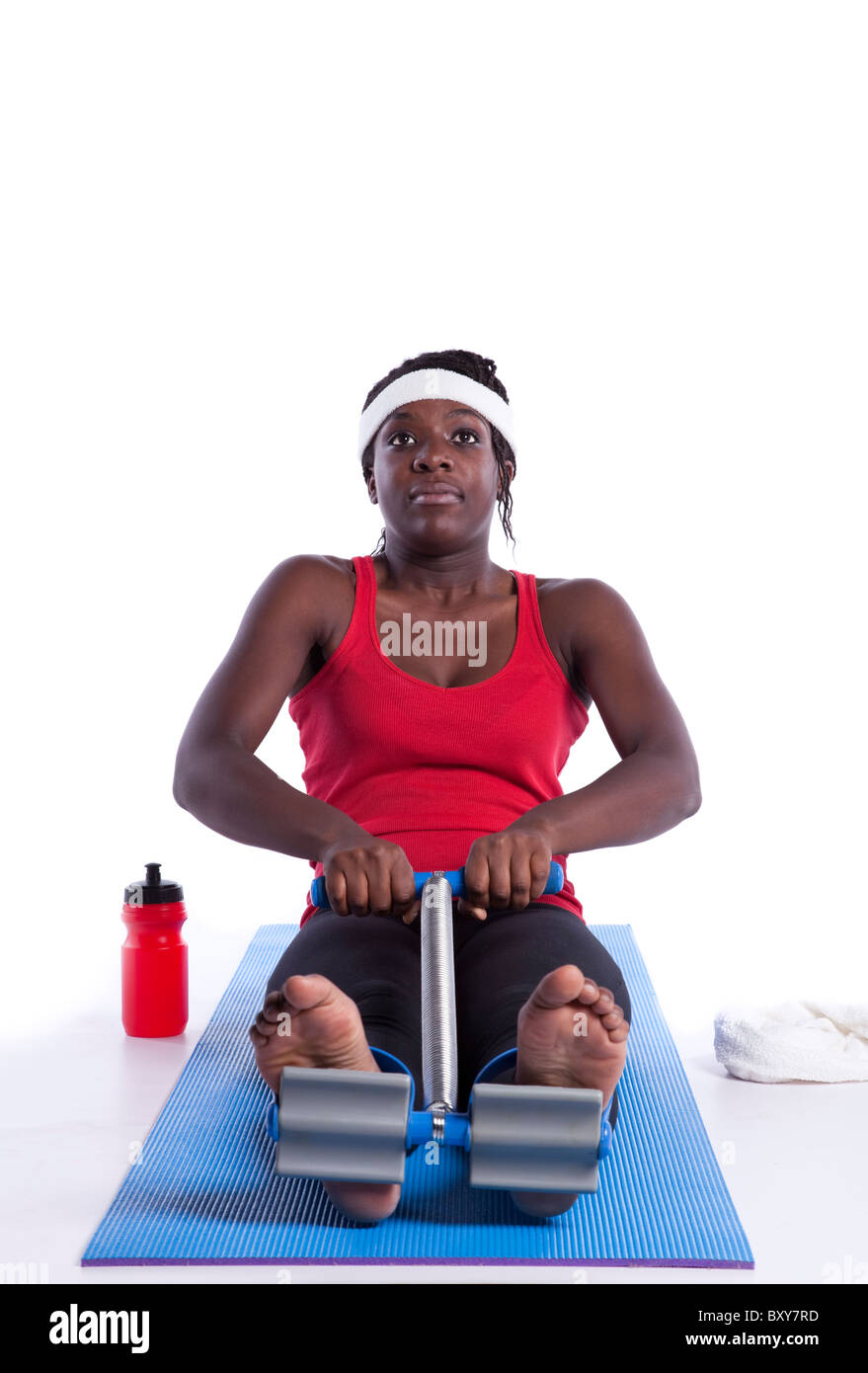 young african woman doing some personal exercise (isolated on white ...