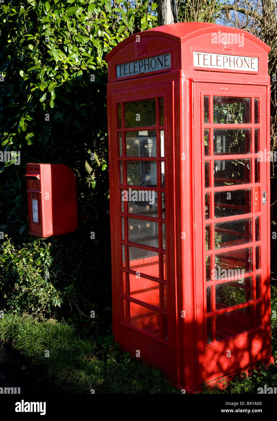 Old style red telephone and post boxes at Sutton West Sussex Stock ...