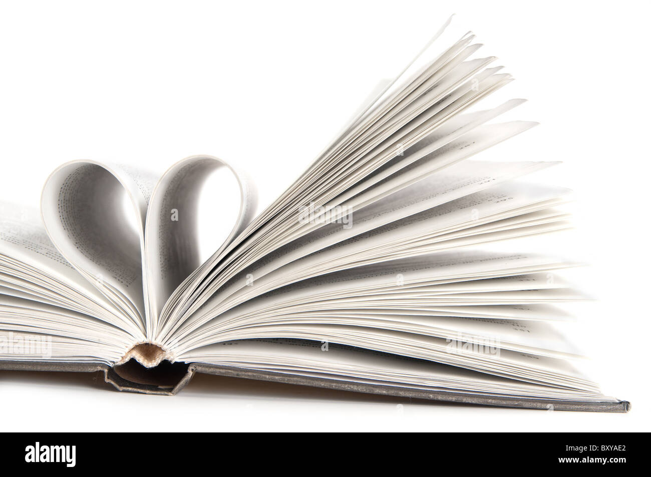 pages of a book curved into a heart shape Stock Photo - Alamy