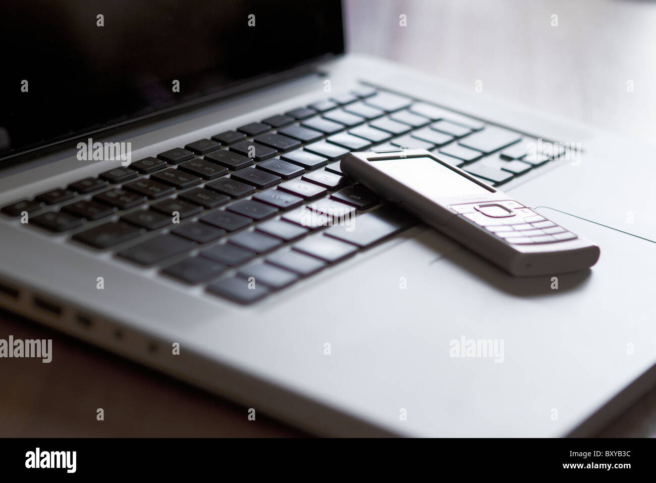 Laptop and mobile phone concept Stock Photo - Alamy