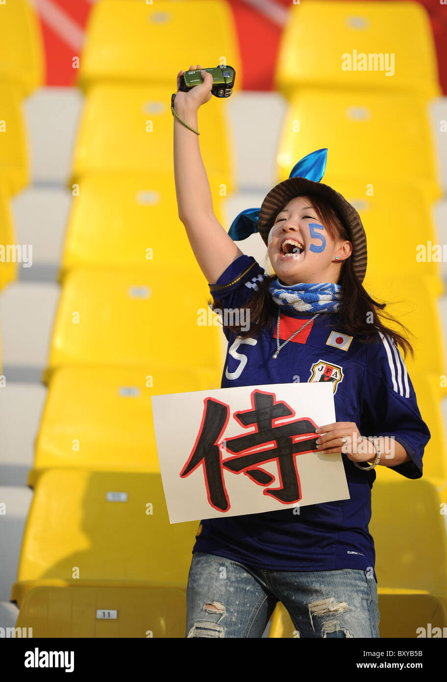 A female football / soccer fan supporting her home nation Stock Photo ...