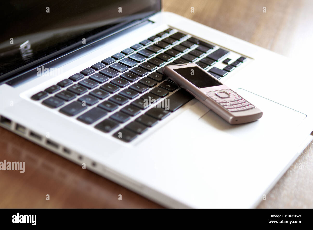Laptop and mobile phone concept Stock Photo - Alamy