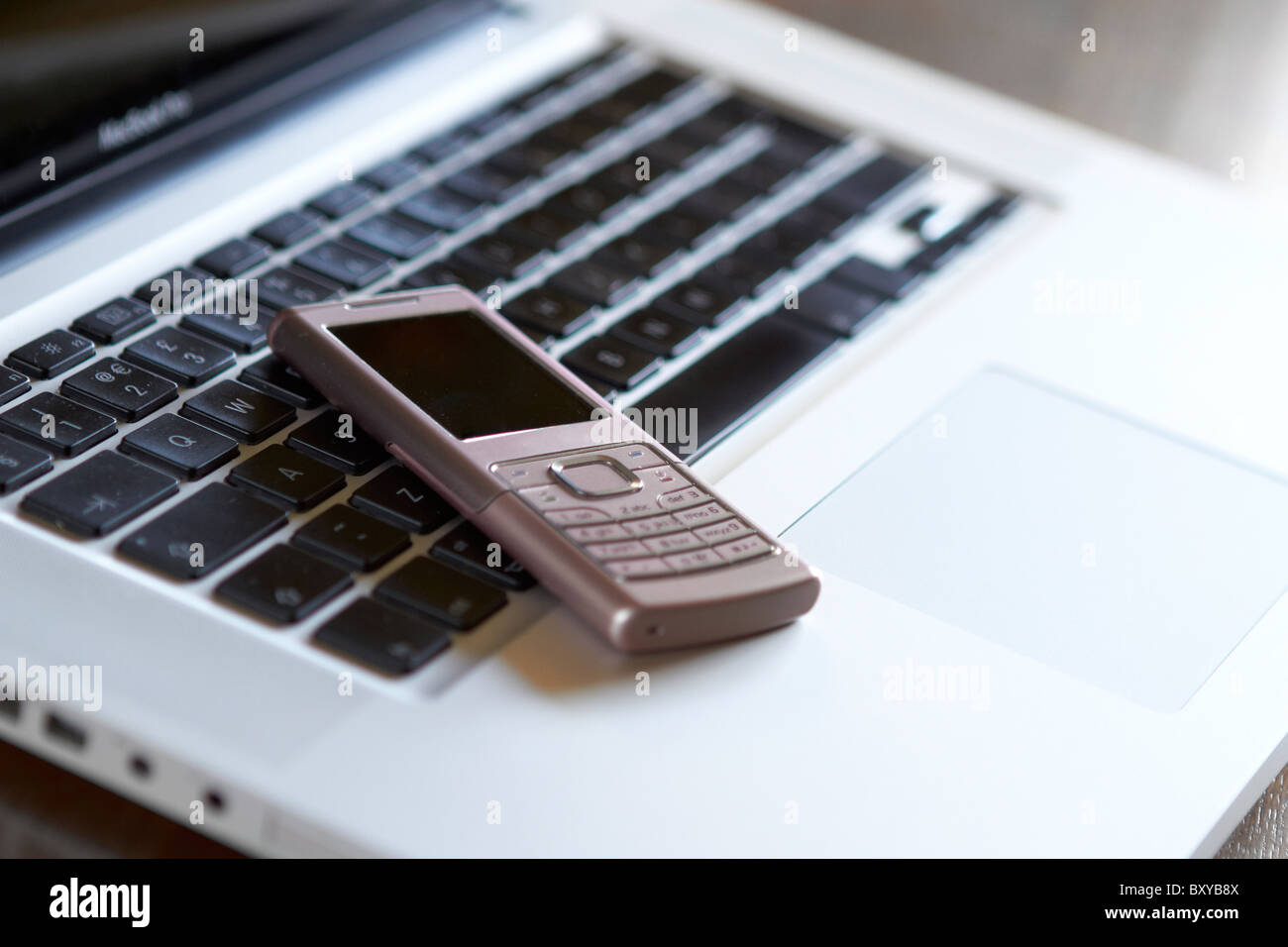 Laptop and mobile phone concept Stock Photo - Alamy