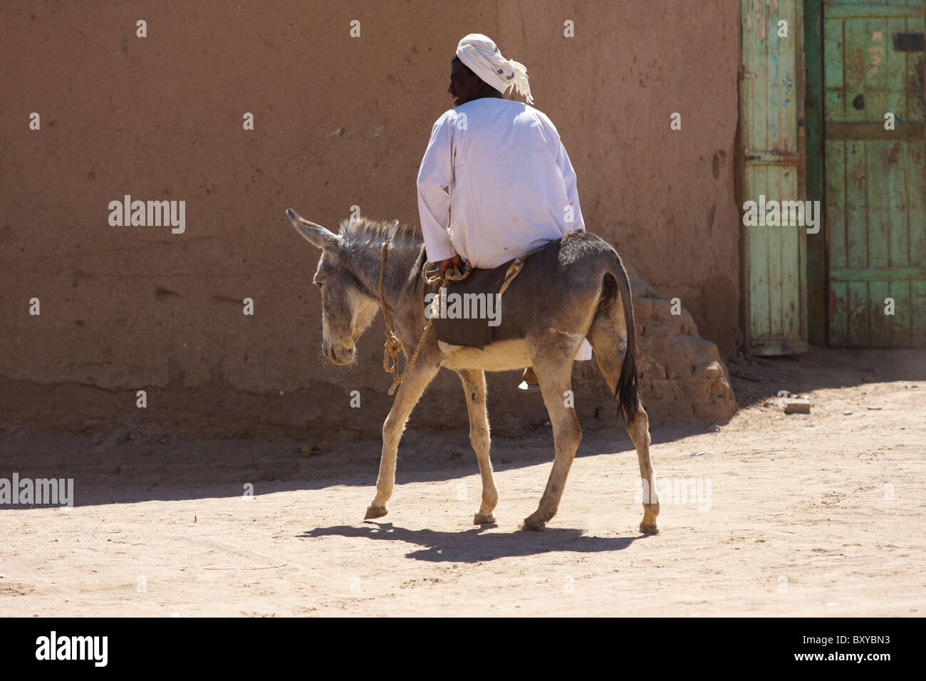 Muslim Man Riding Donkey In Stock Photos & Muslim Man Riding Donkey In ...
