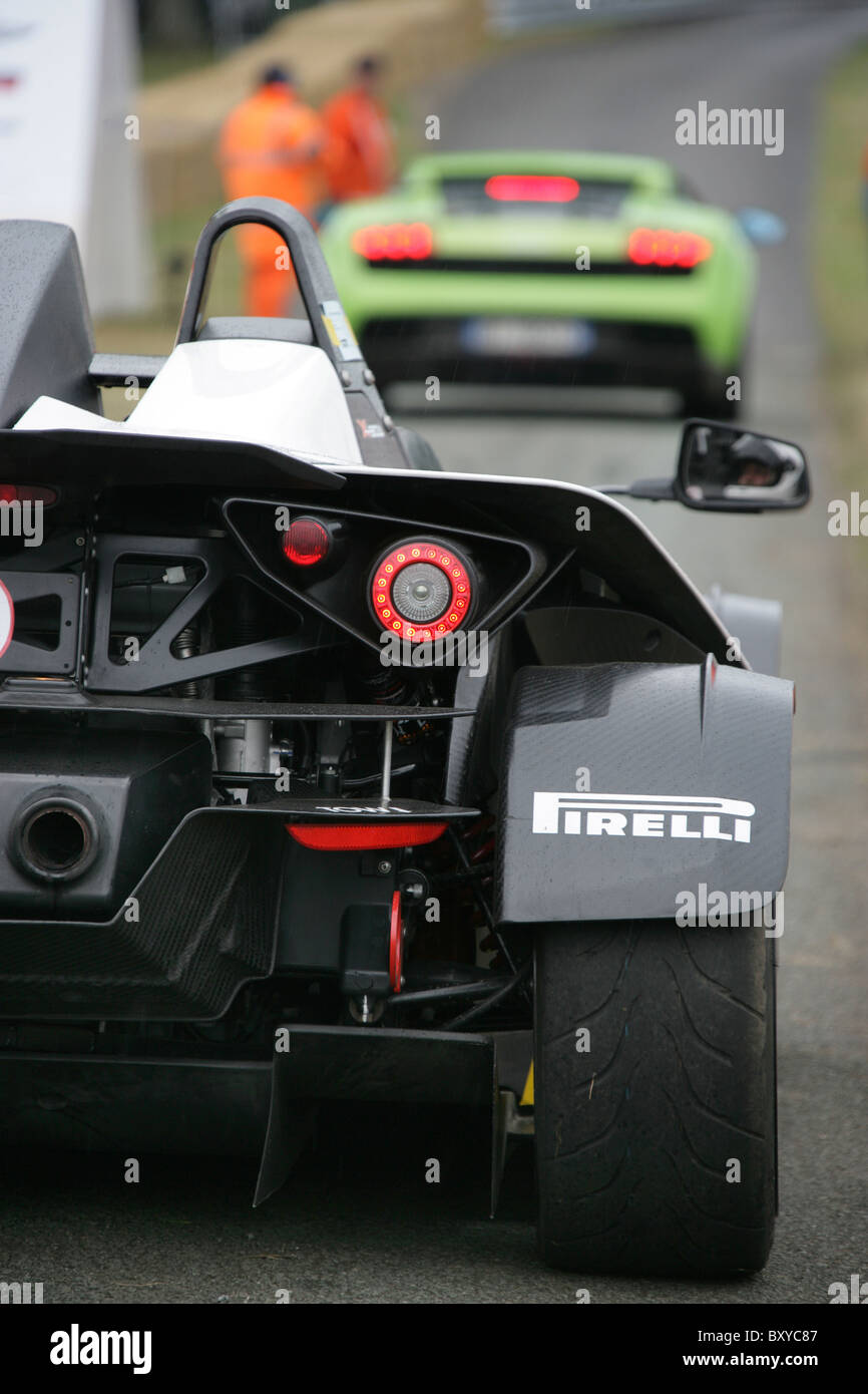 Cholmondeley Castle Gardens. Racing cars line up at the start line of ...