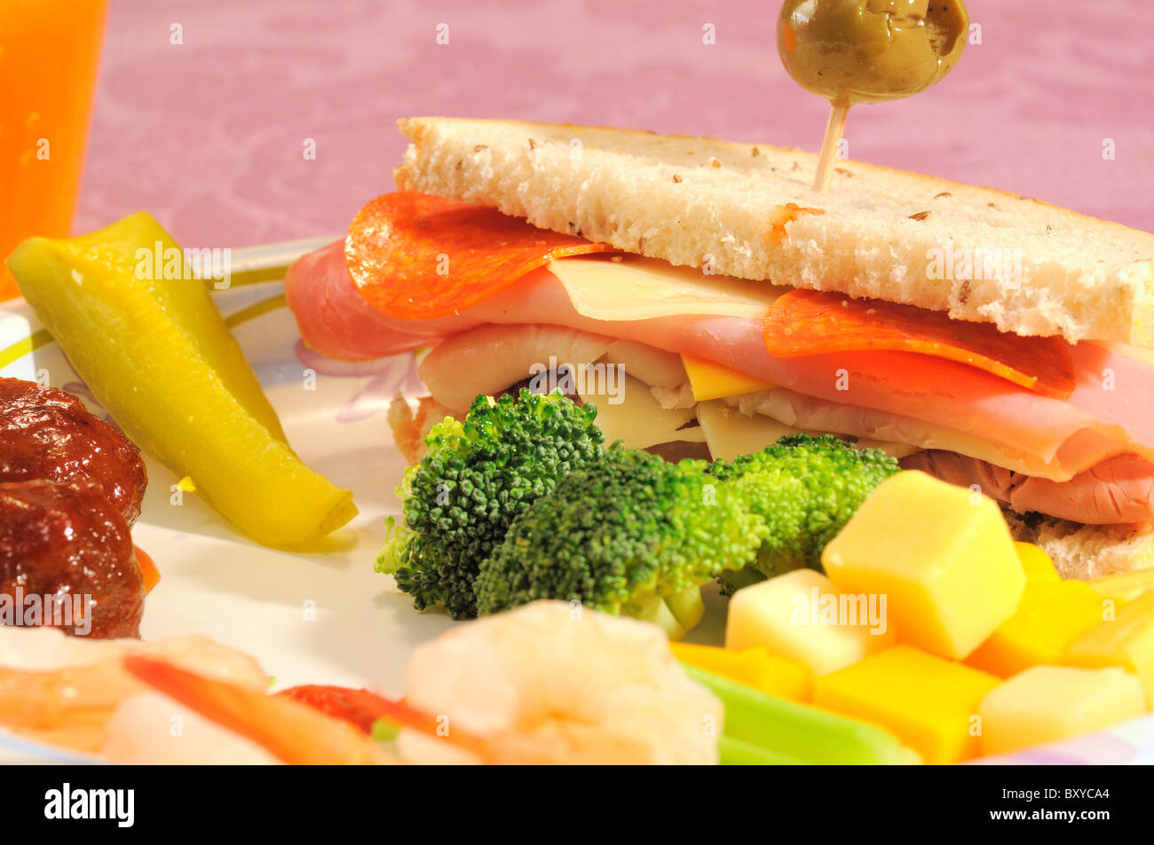 Close view of a fancy paper plate with sandwich and party food Stock ...