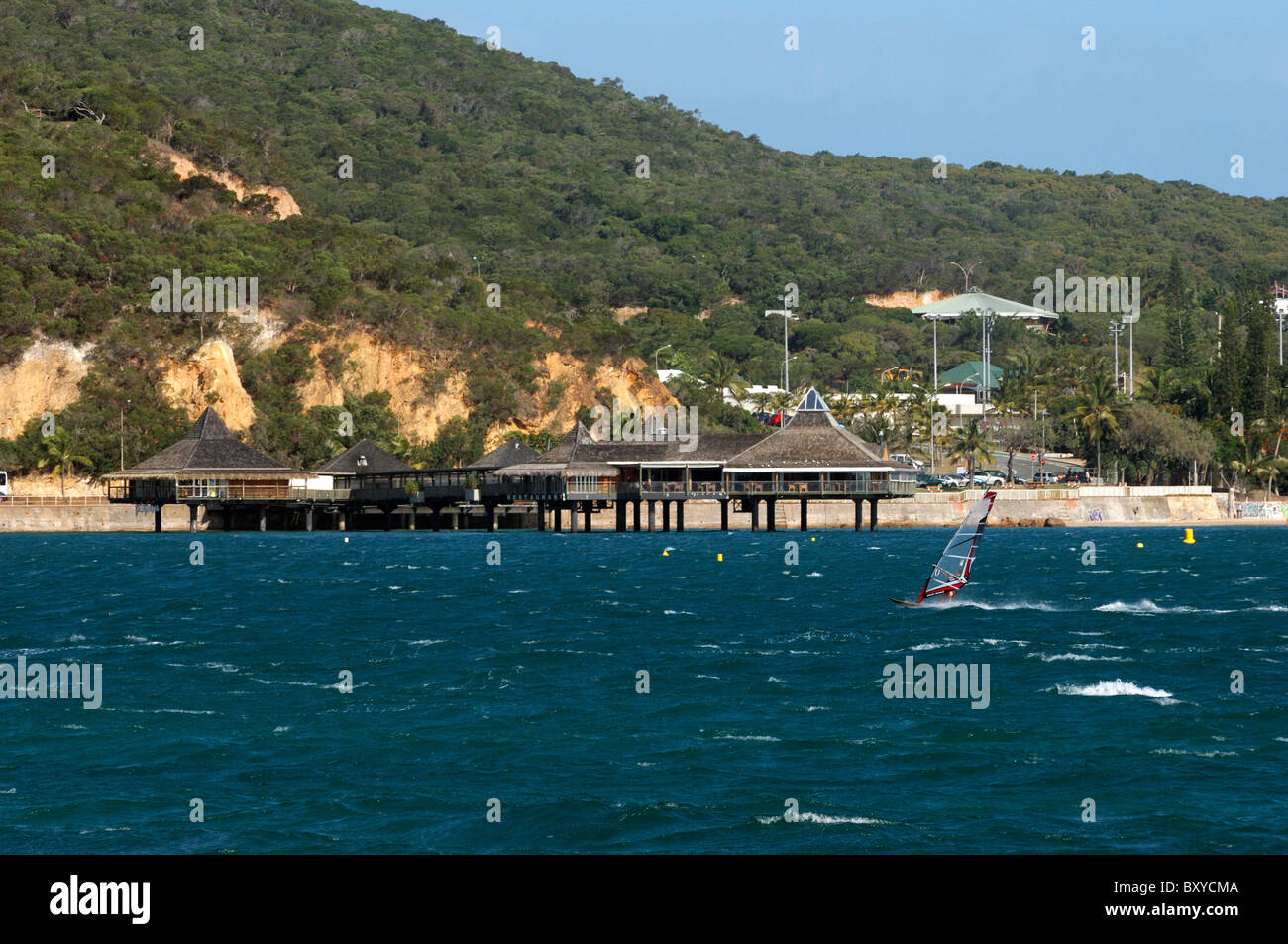 Windsurfing at Anse Vata bay, beach station at Noumea, New Caledonia ...