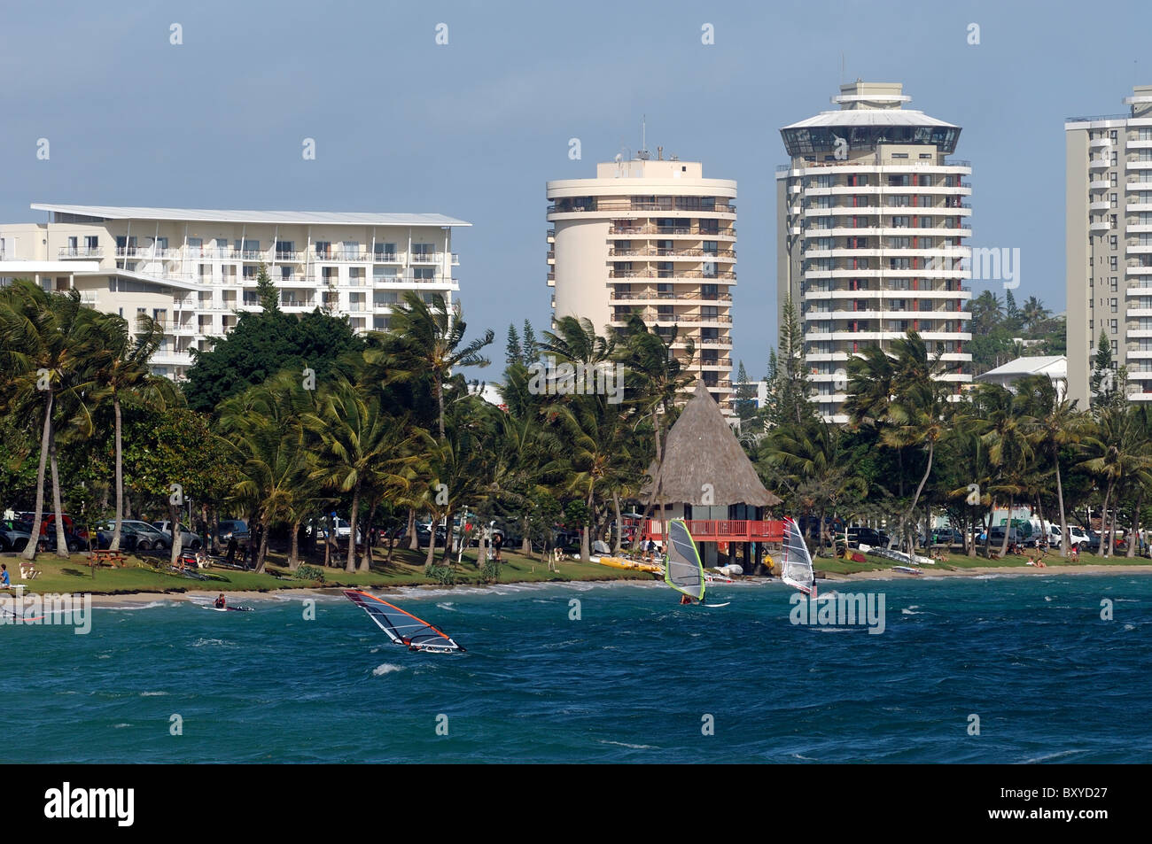 Windsurfing at Anse Vata bay, beach station at Noumea, New Caledonia ...