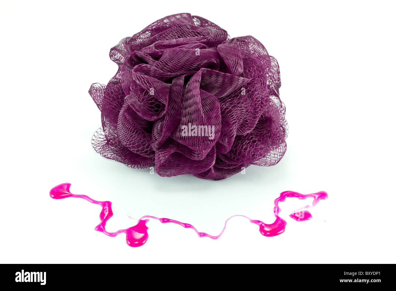 Purple bath sponge and shower gel Stock Photo - Alamy