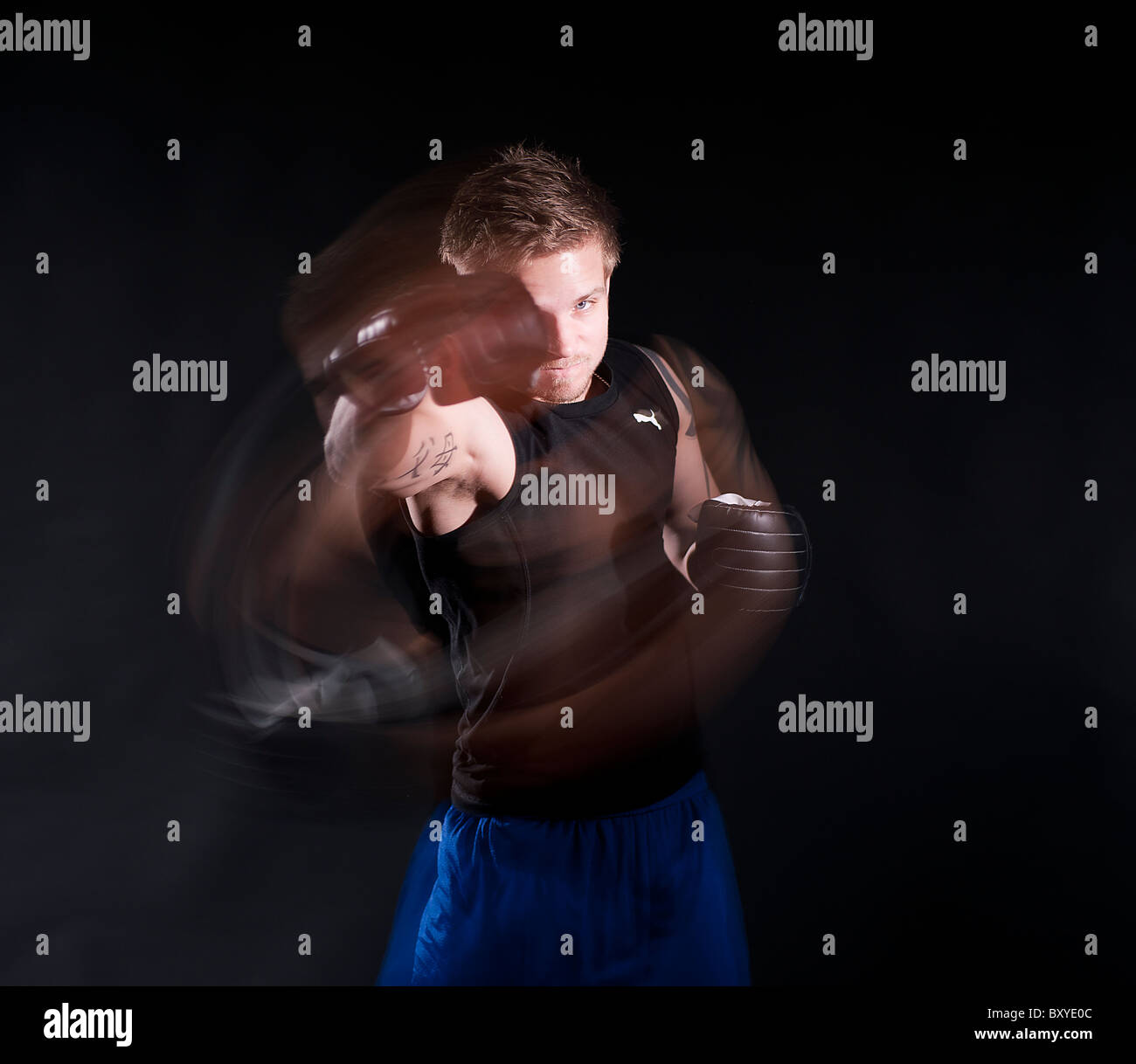 Boy training boxing exercise movement hi-res stock photography and ...