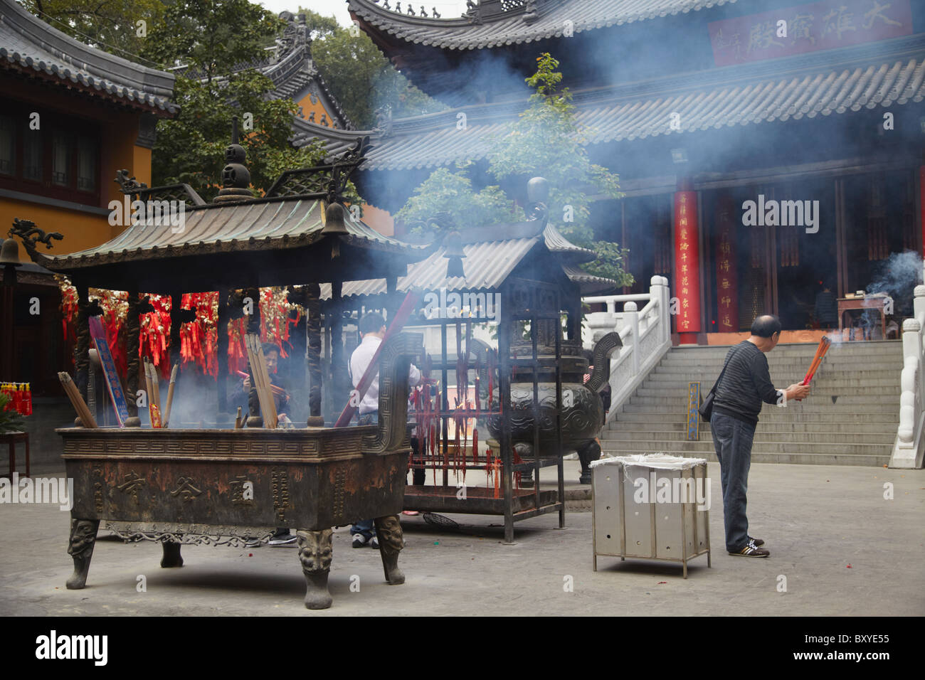 People praying at Linggu Temple, Zijin Shan, Nanjing, Jiangsu, China ...