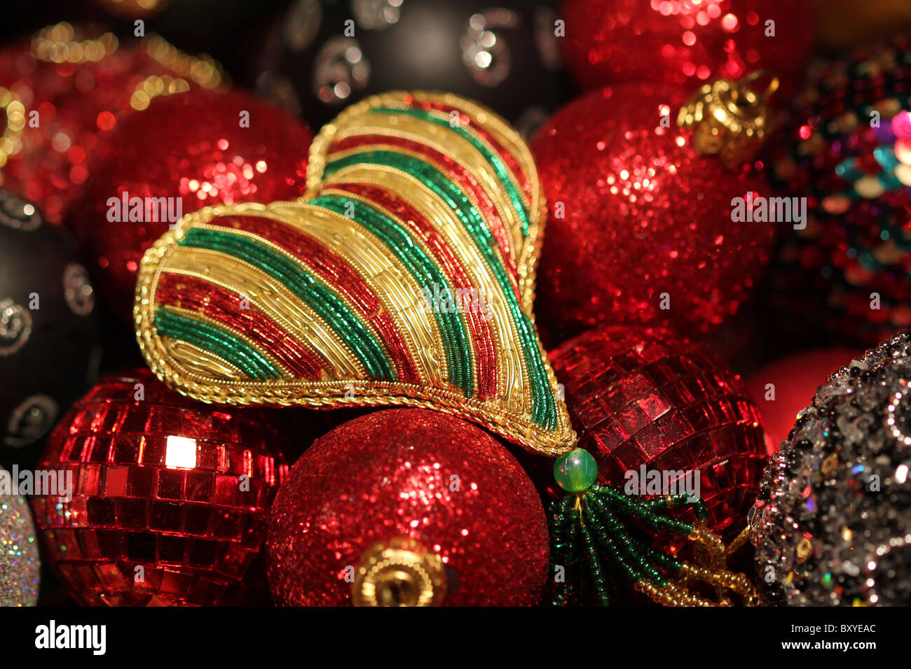 Red silver and heart shaped Christmas baubles Stock Photo - Alamy
