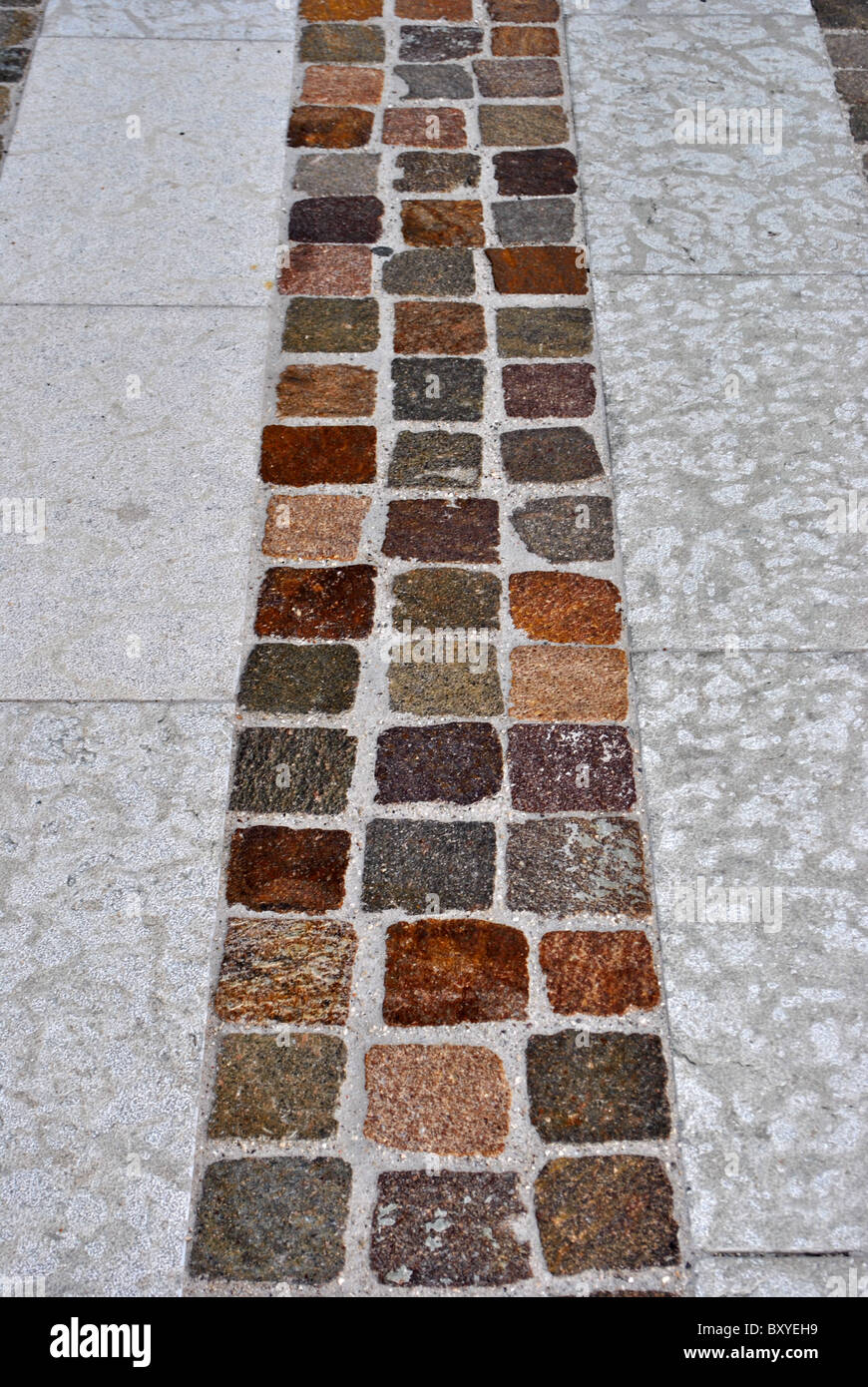paving slabs and blocks of porphyry with white and colored shades Stock ...