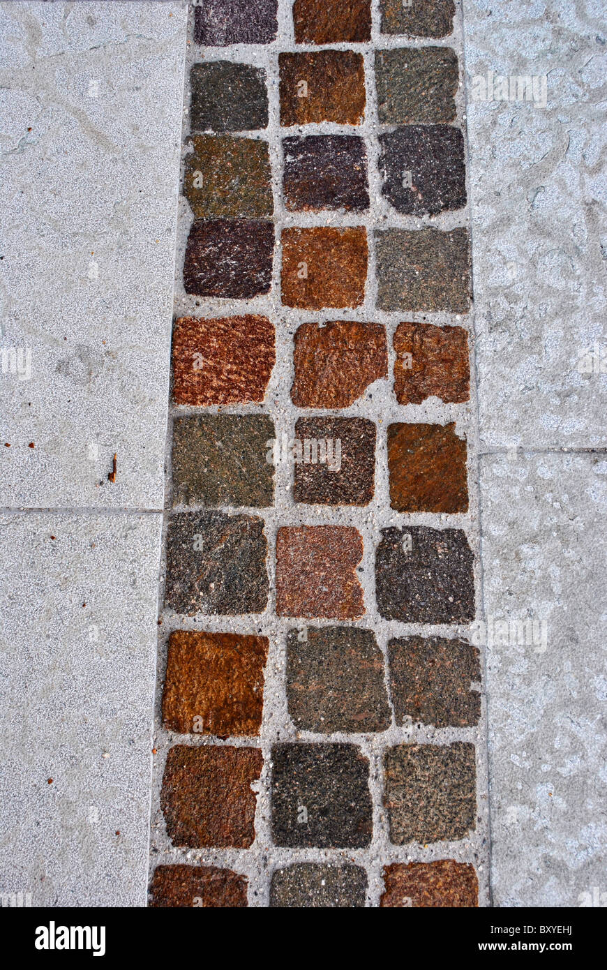 paving slabs and blocks of porphyry with white and colored shades Stock ...