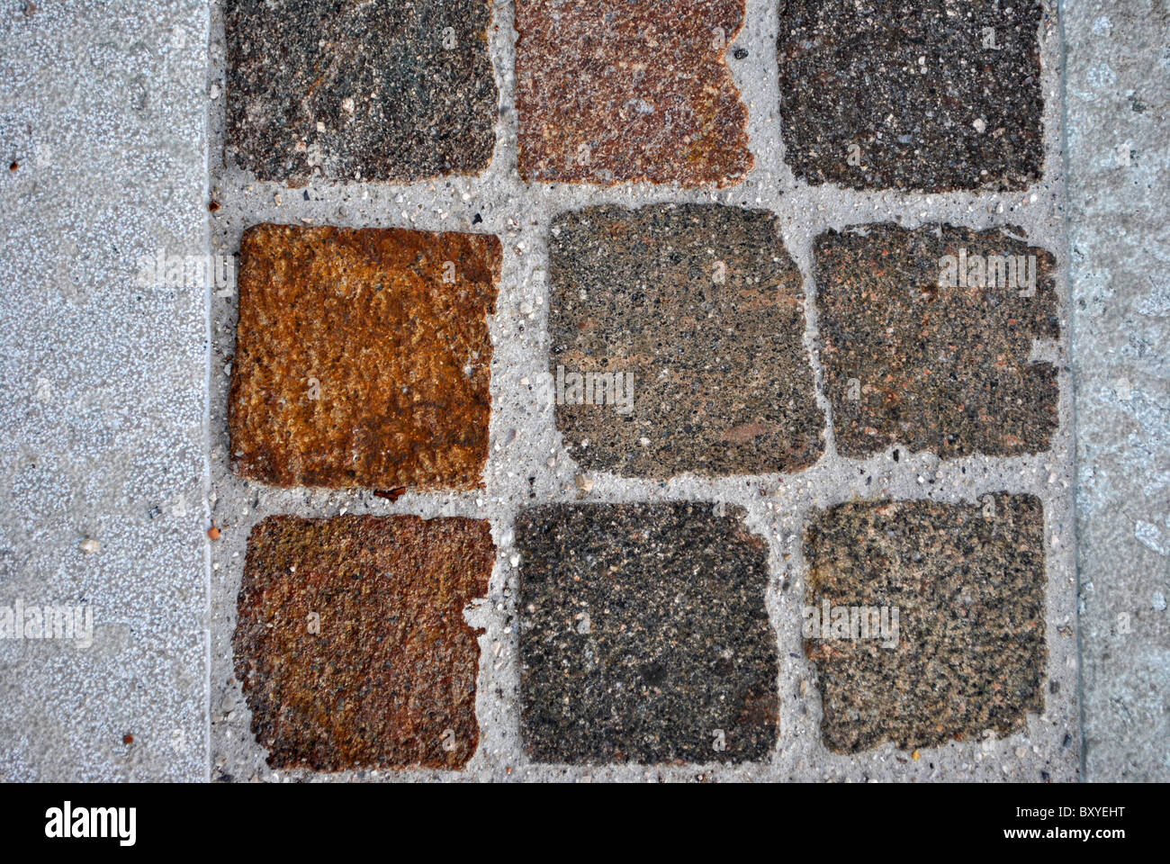 paving slabs and blocks of porphyry with white and colored shades Stock ...