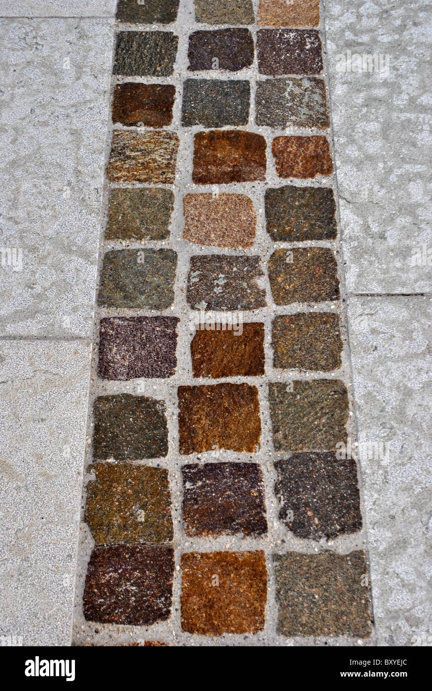 paving slabs and blocks of porphyry with white and colored shades Stock ...