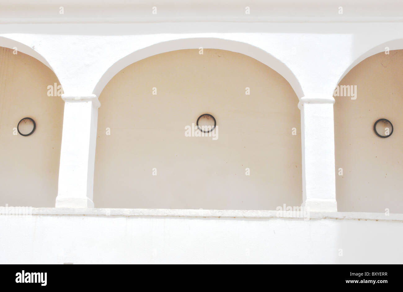 concrete arches and white plaster in old building and renovated Stock ...