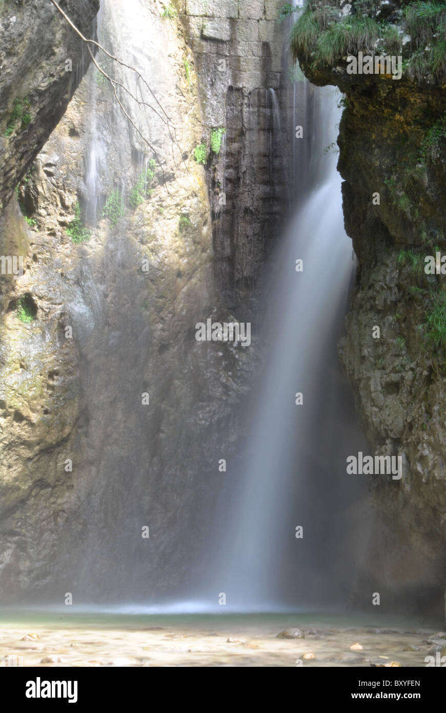 cascade of pure fresh water falling from the steep rocks Stock Photo ...