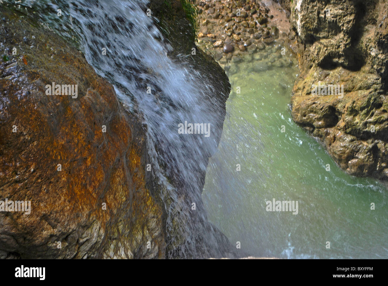 pure and sparkling waterfall falling over rocks Stock Photo - Alamy