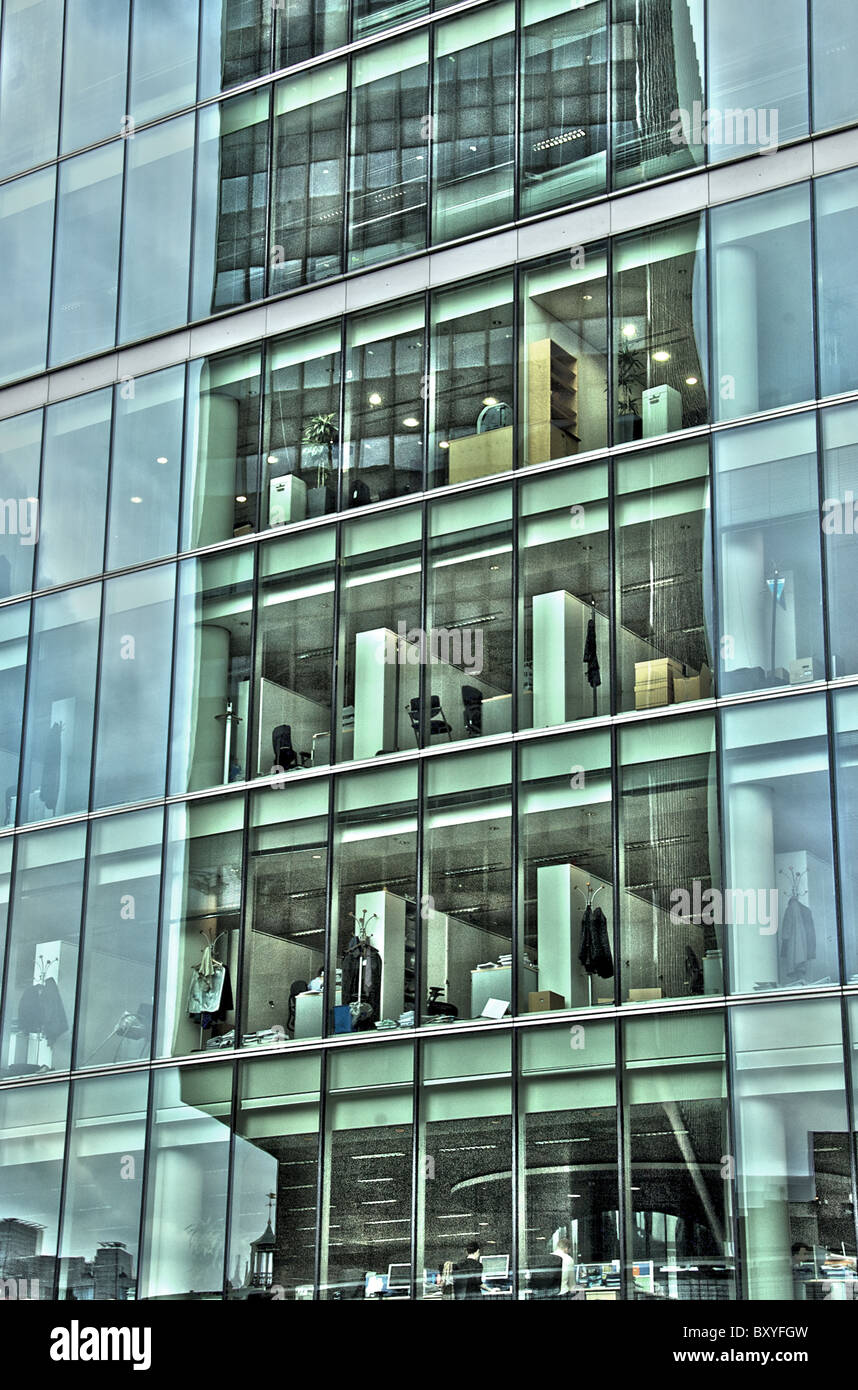 High rise building in London with offices seen through glass walls ...