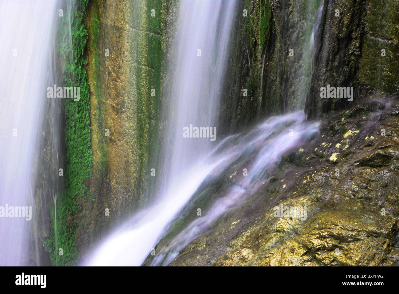 pure and sparkling waterfall falling over rocks Stock Photo - Alamy