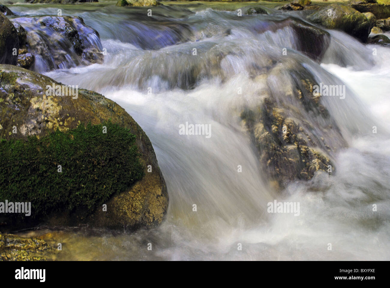 pure and sparkling waterfall with rocks Stock Photo - Alamy