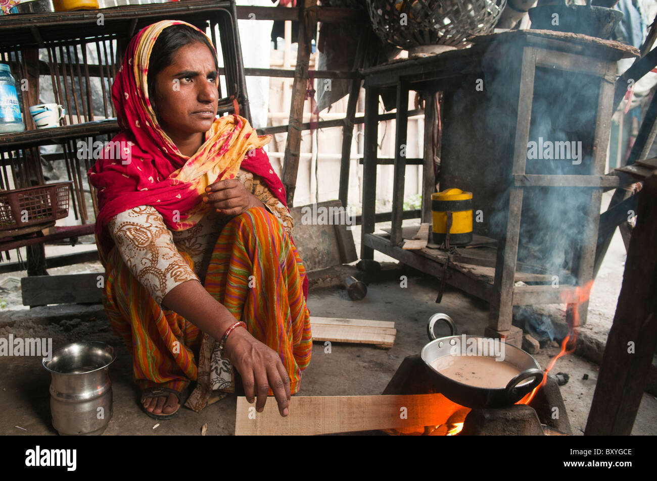 Indian poor woman cooking hi-res stock photography and images - Alamy