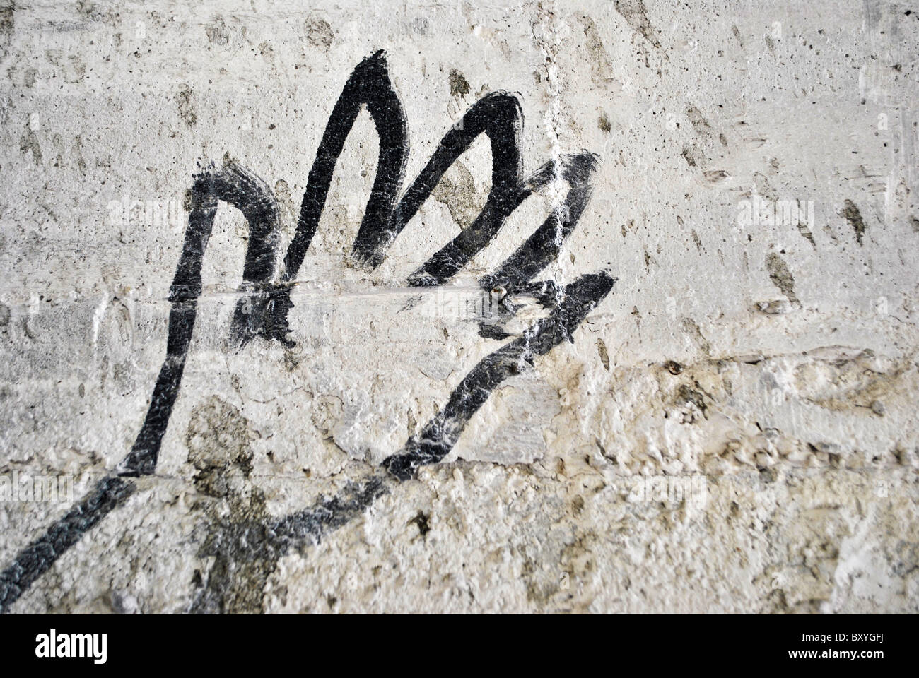 graffiti on the concrete wall stylized hand Stock Photo - Alamy