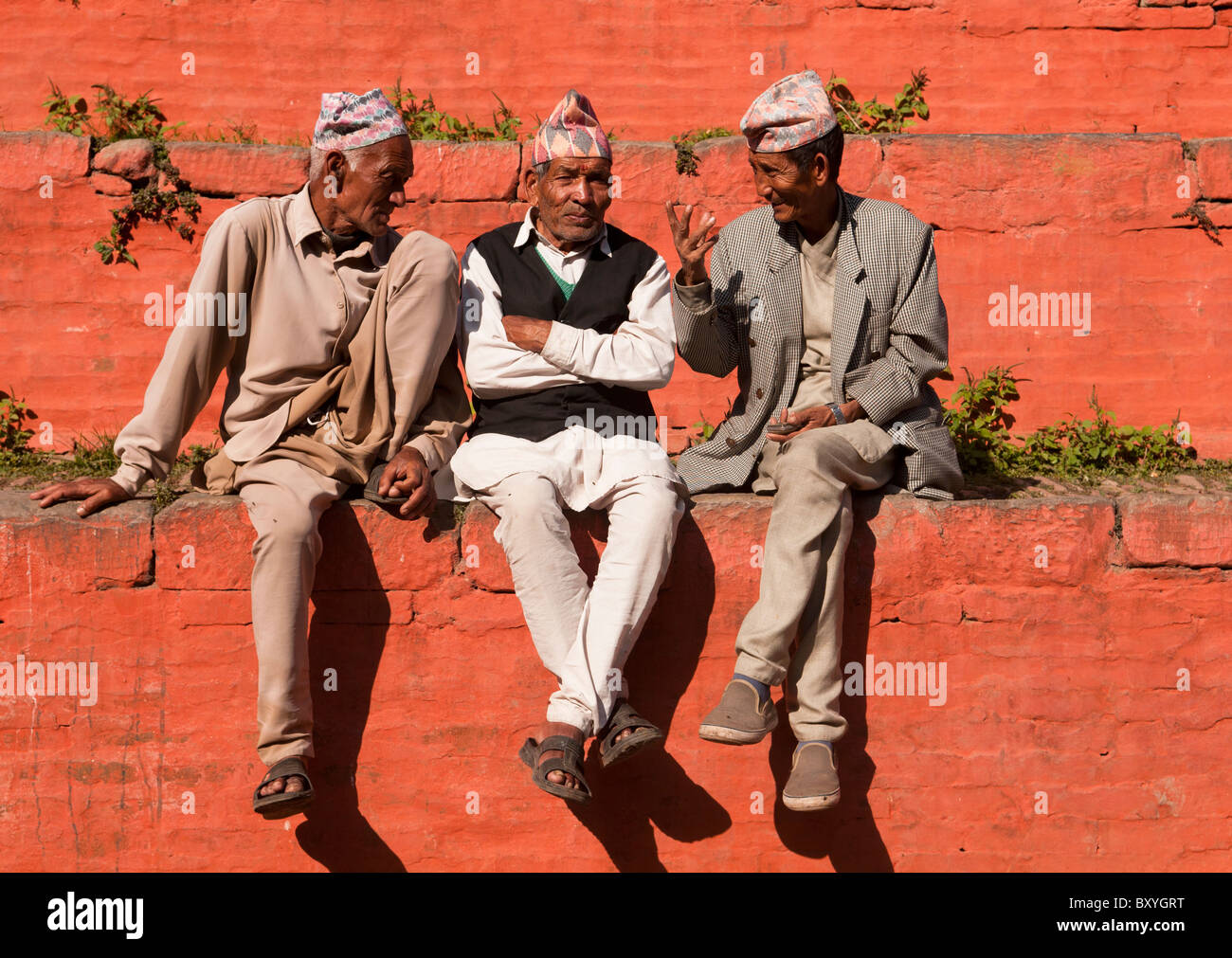 Nepali men relaxing in Durbar Square in Kathmandu Stock Photo - Alamy