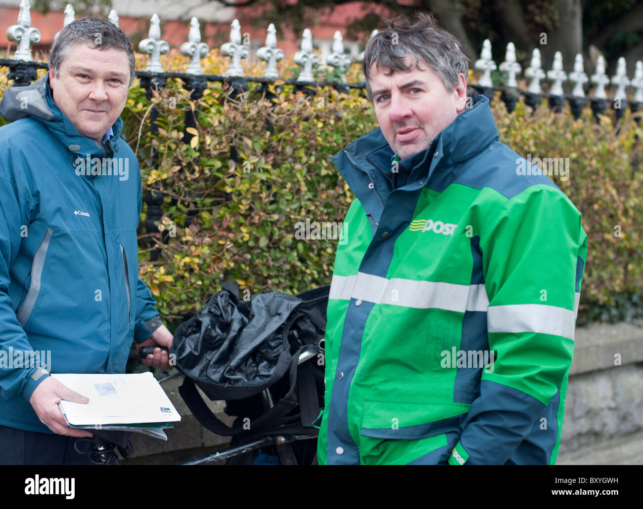Two Irish postmen seen doing their rounds in Limerick, Republic of ...