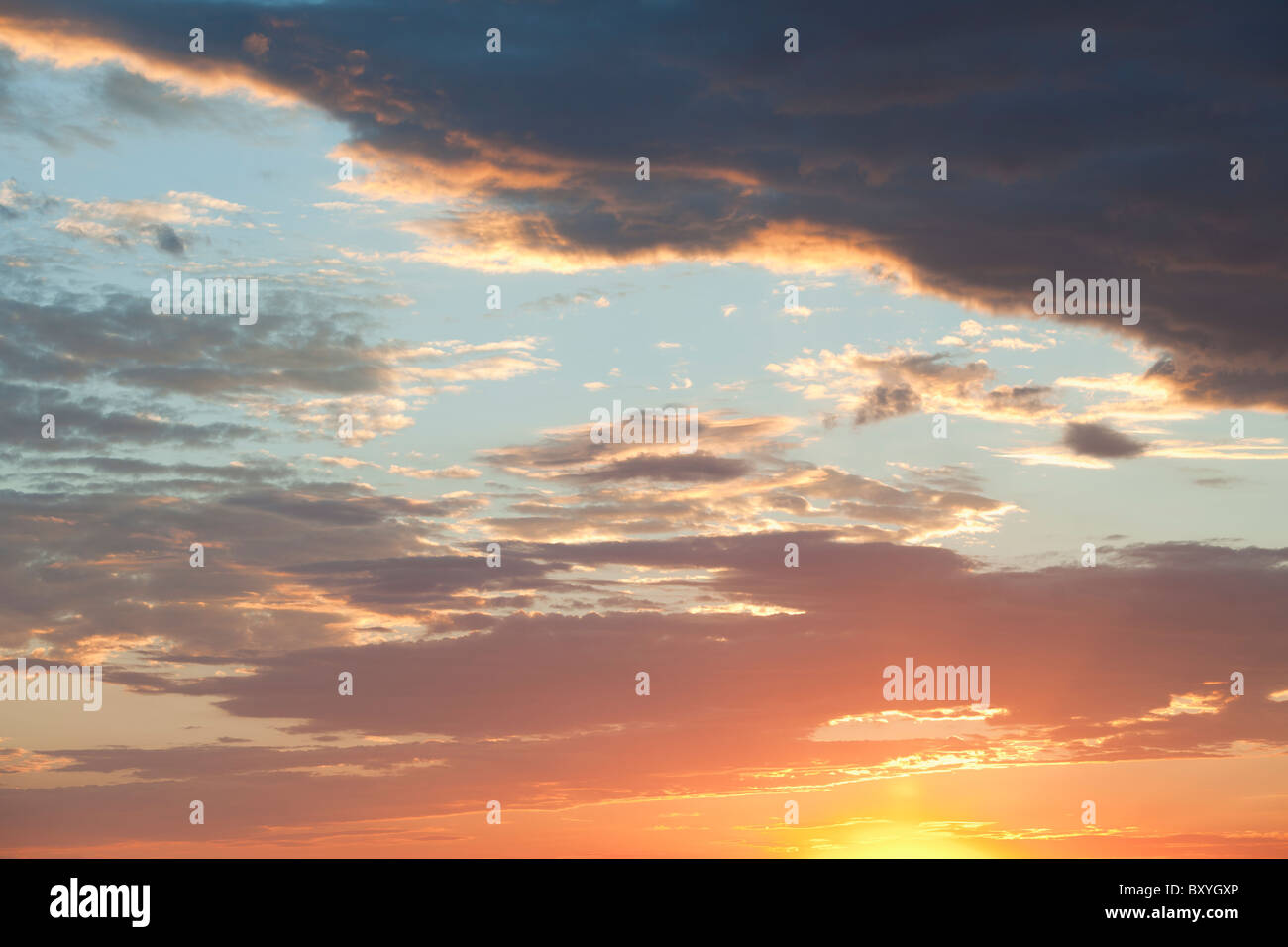 Moody sky at sunset Stock Photo - Alamy