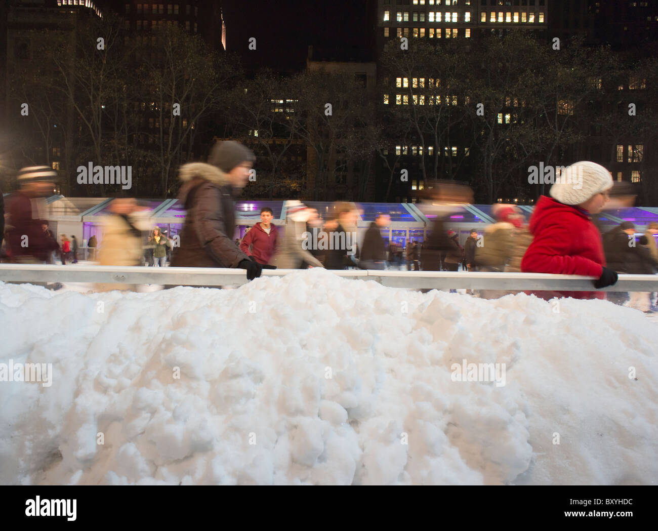 Skaters maneuver the packed Pond at Bryant Park ice skating rink in New ...