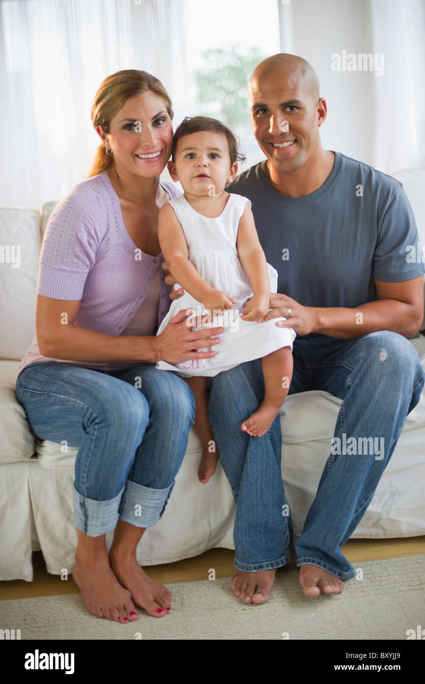 Young family with small girl Stock Photo - Alamy