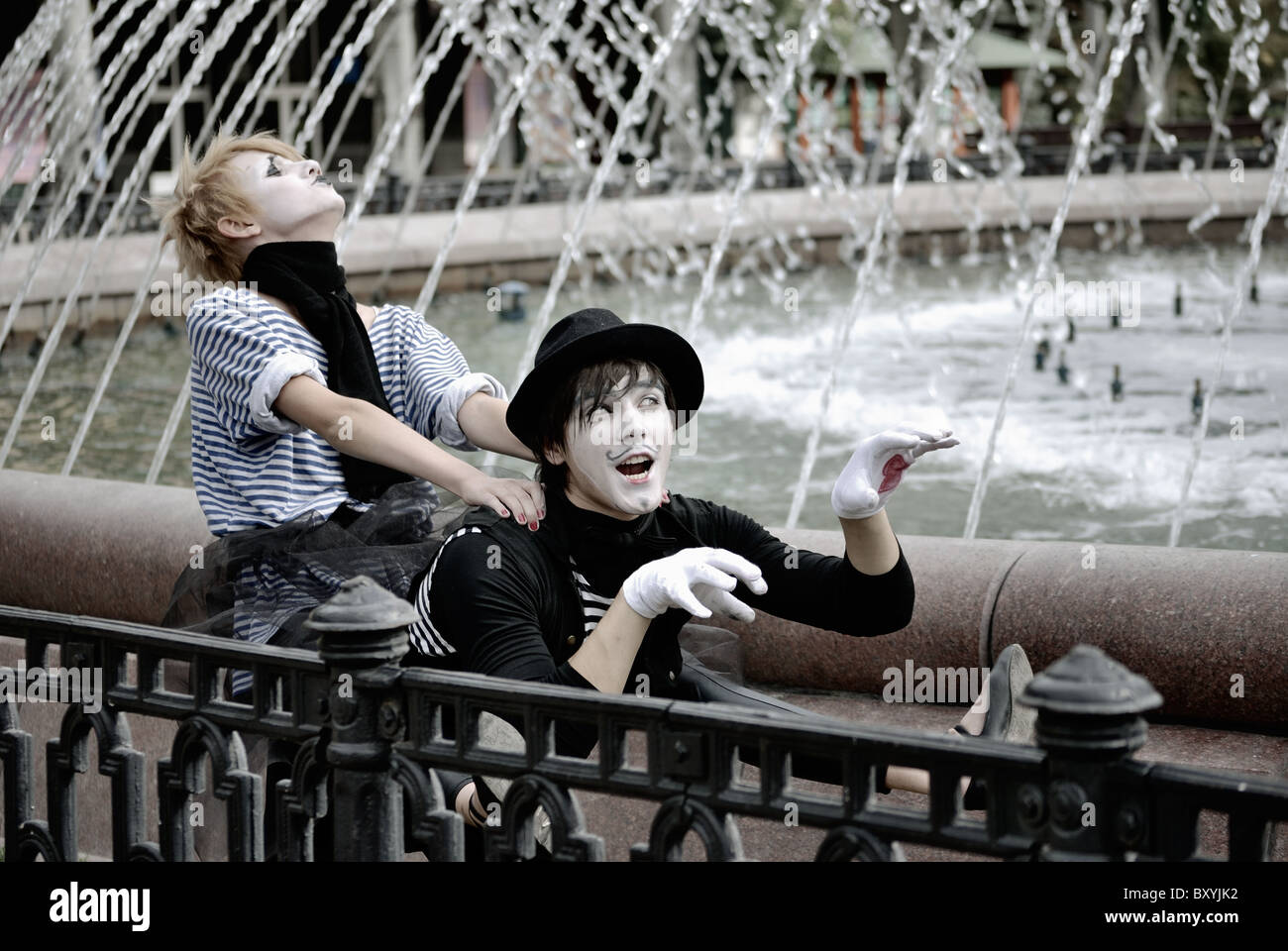 two mimes at fountain. pantomime Stock Photo - Alamy