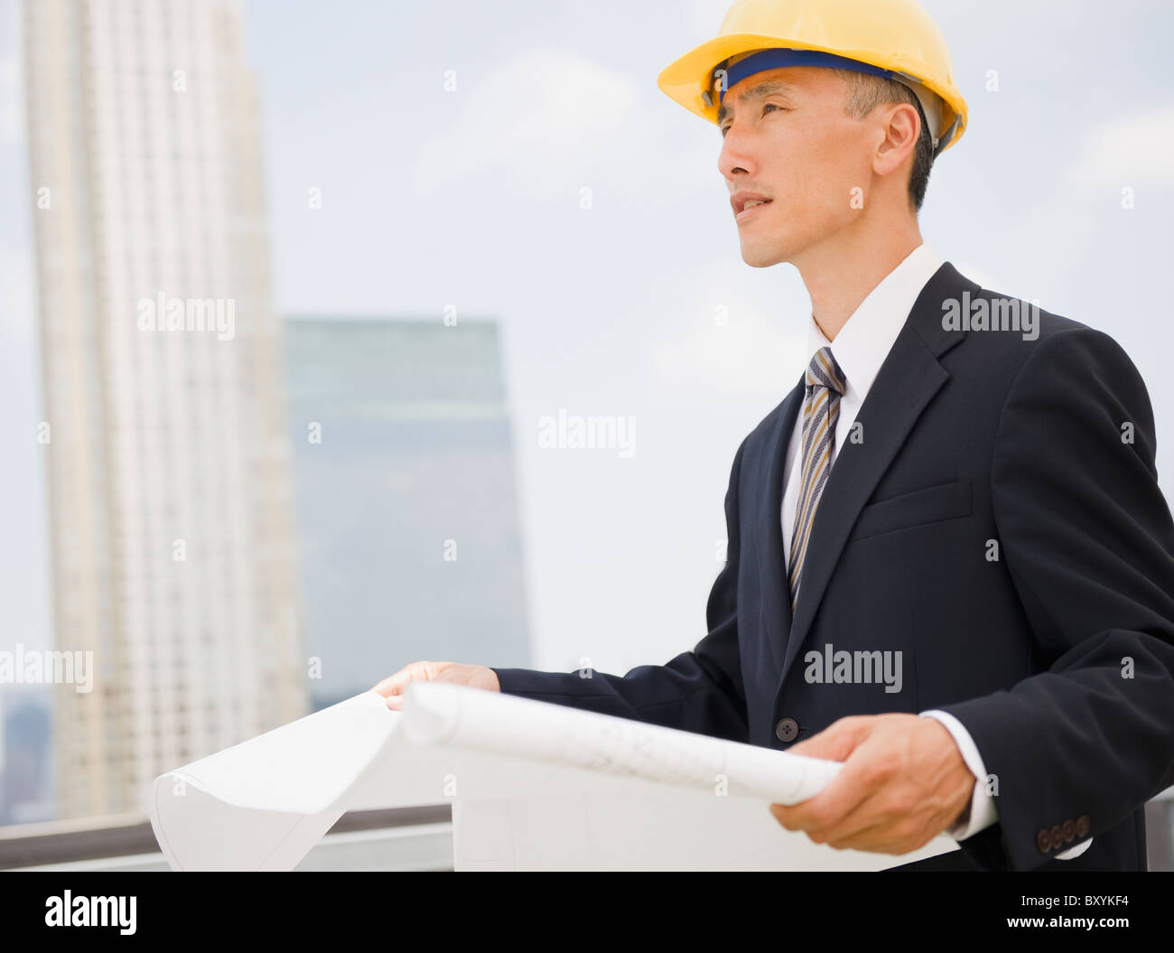 Standing side by side looking away holding authority hi-res stock ...
