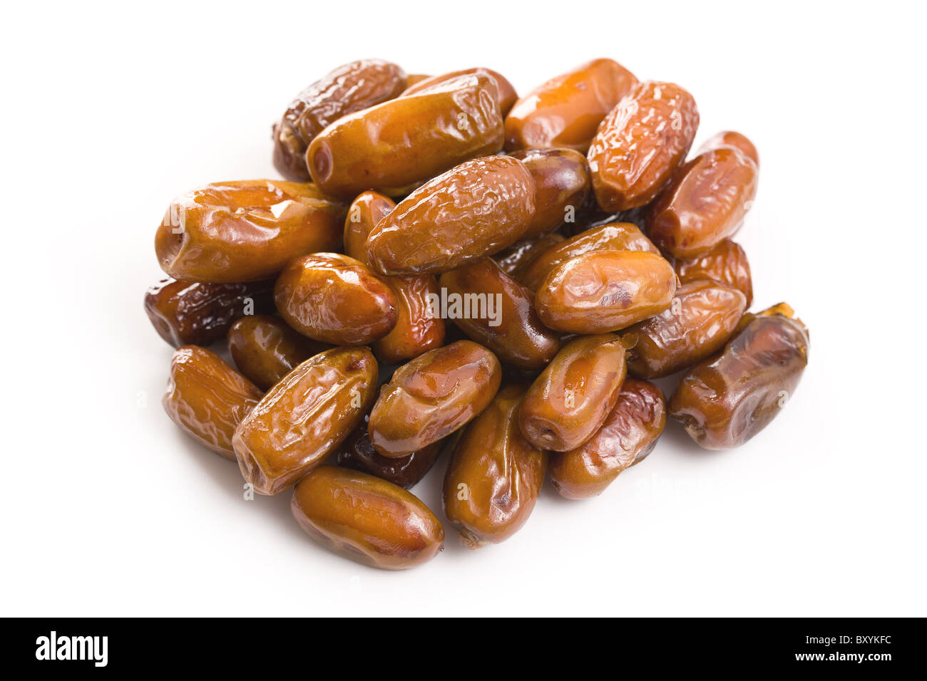 dried dates on white background Stock Photo - Alamy