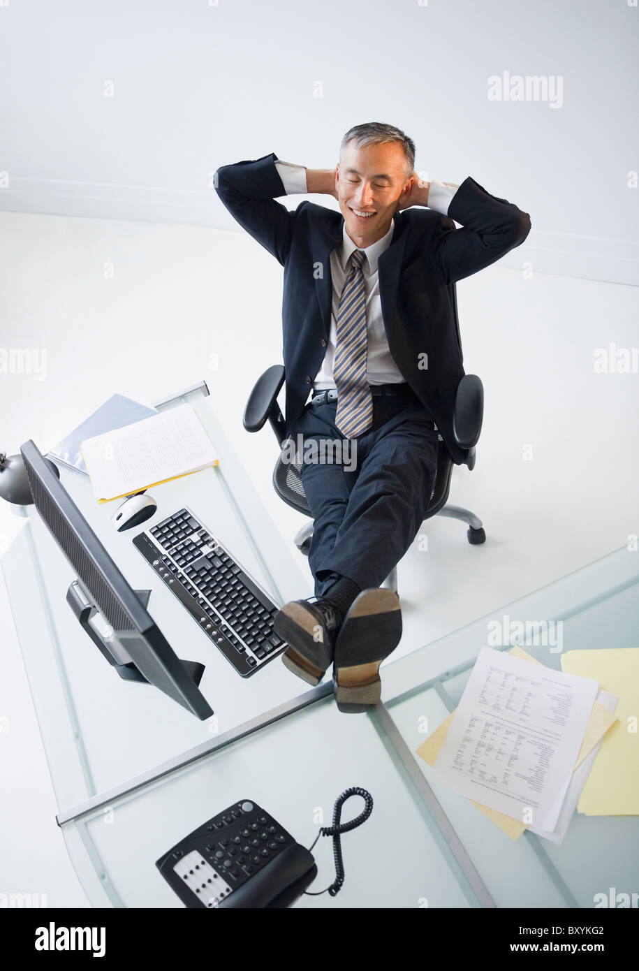 Feet On Desk High Resolution Stock Photography and Images - Alamy