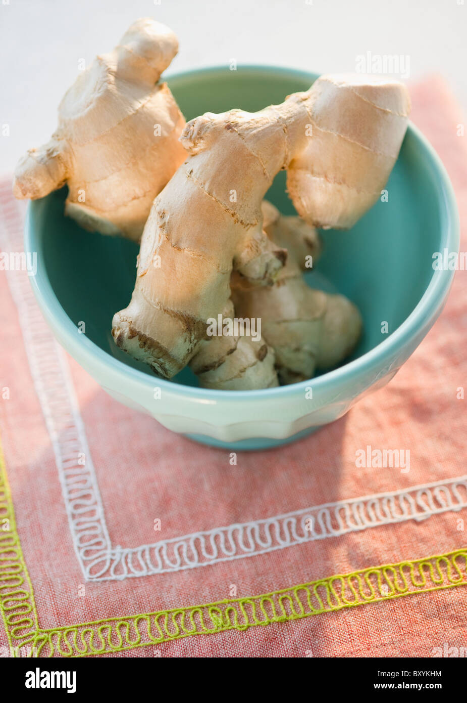 Fresh ginger root in bowl, high angle view Stock Photo - Alamy