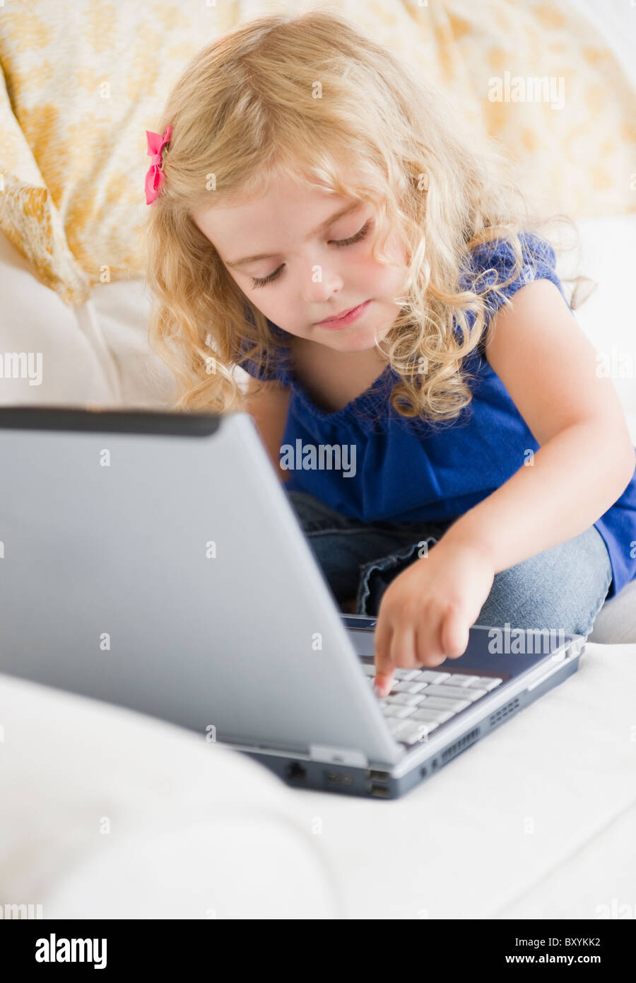 Girl using laptop Stock Photo - Alamy