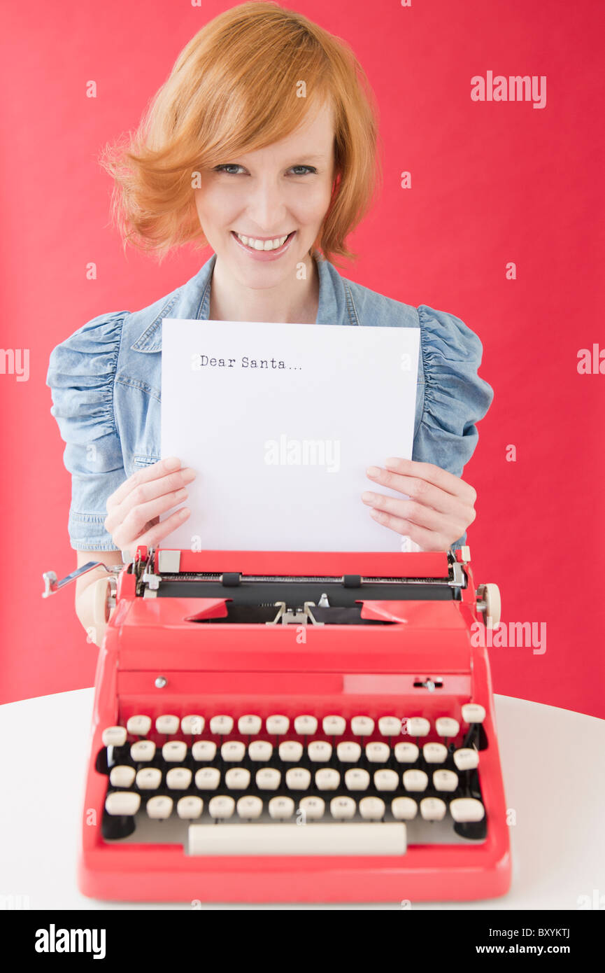 Woman and typewriter hi-res stock photography and images - Alamy