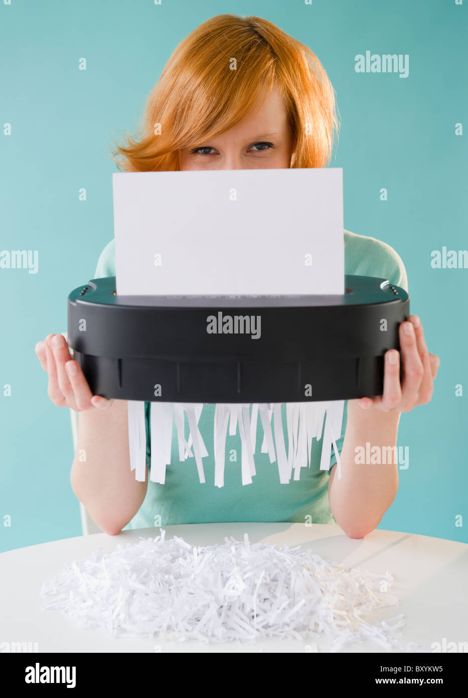 Young woman paper destruction hi-res stock photography and images - Alamy