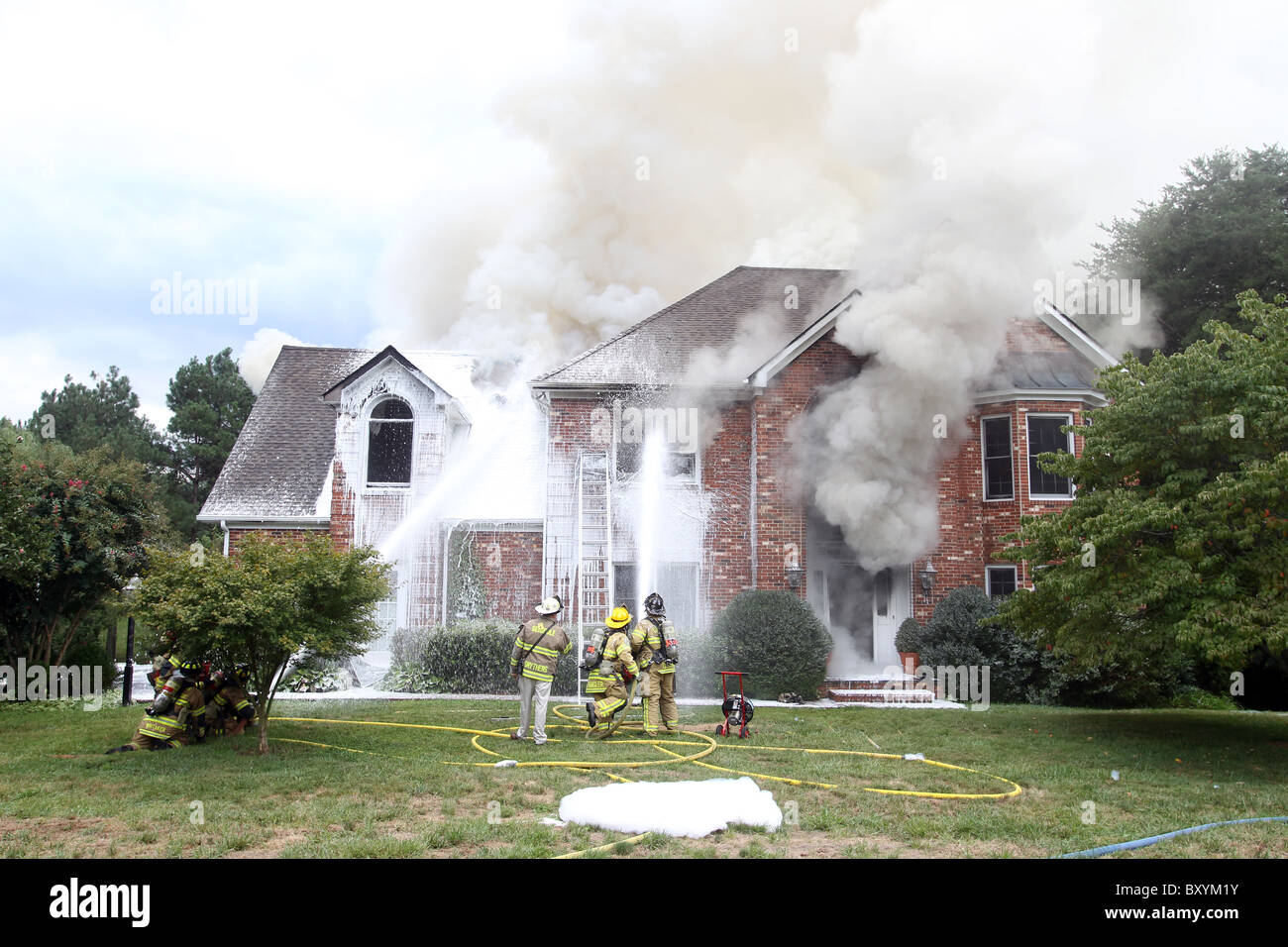 Firefighters take turns putting out a house fire in Charlottesville ...
