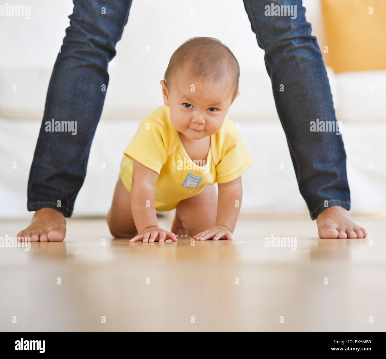 Baby between mother's legs hi-res stock photography and images - Alamy