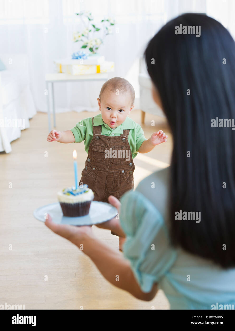 Mum giving birthday cake hi-res stock photography and images - Alamy