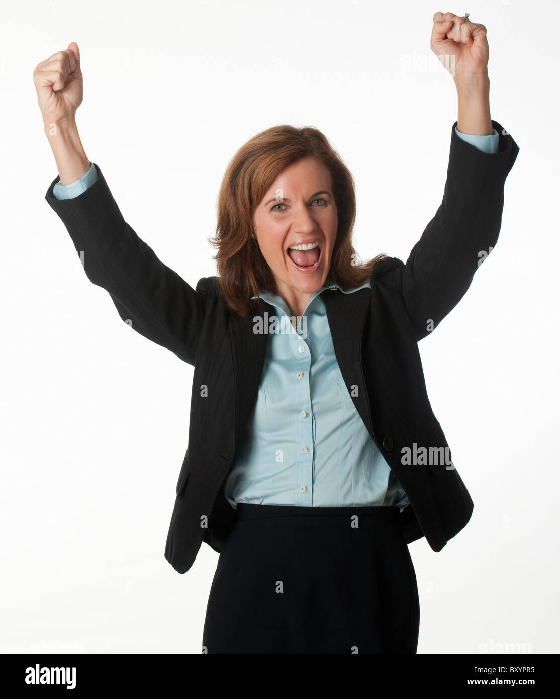 Business woman cheering with her arms raised Stock Photo - Alamy