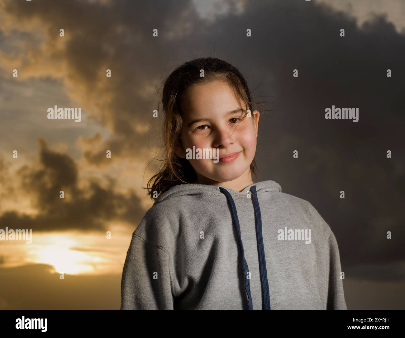 portrait of a young girl at sunset Stock Photo - Alamy
