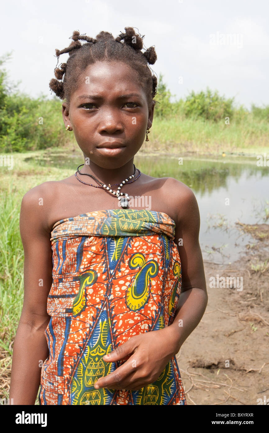 A girl whose village participated in an income generation project to ...
